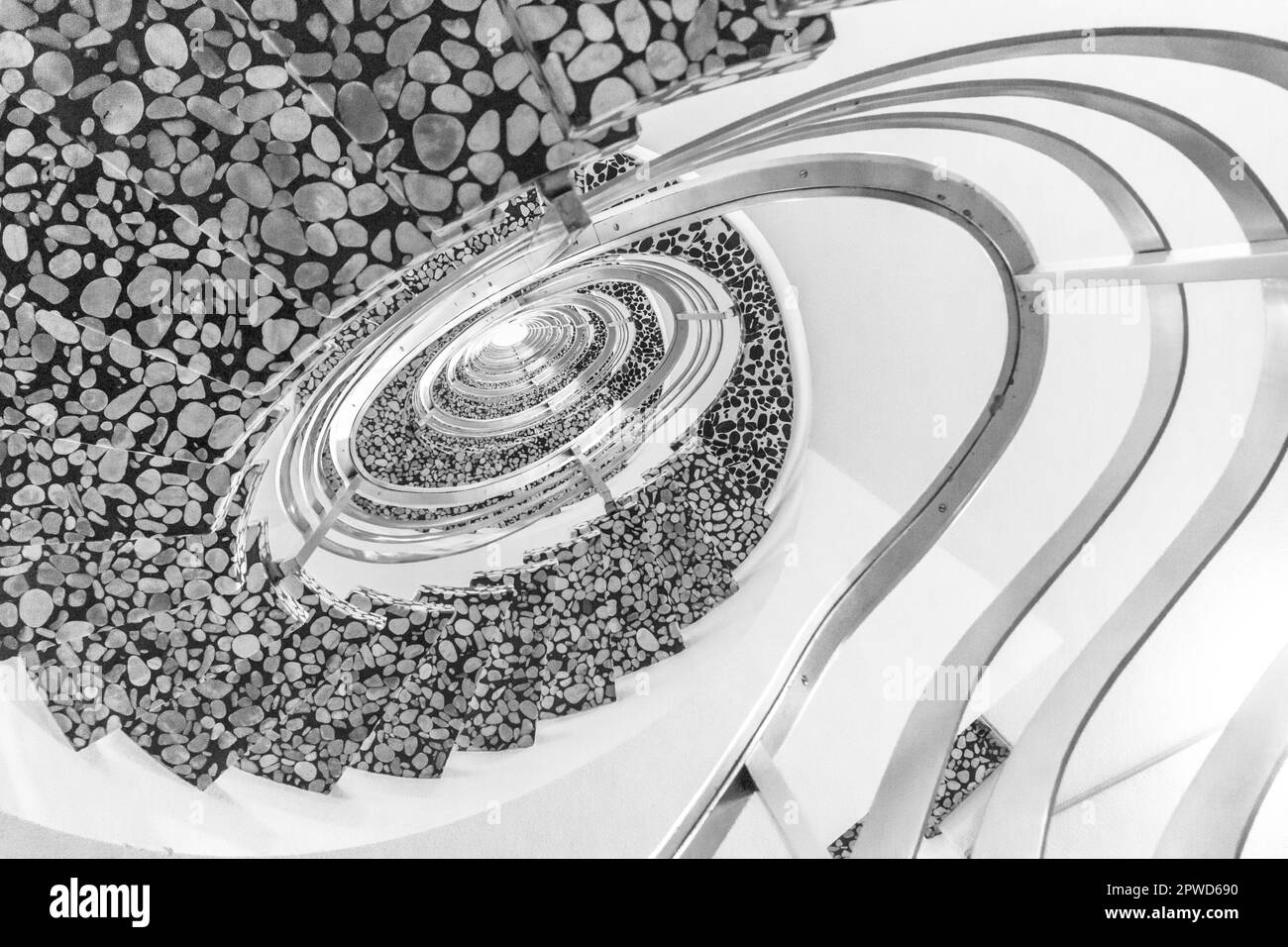 Sprial staircase forming a beautiful whirling pattern - black and white ...
