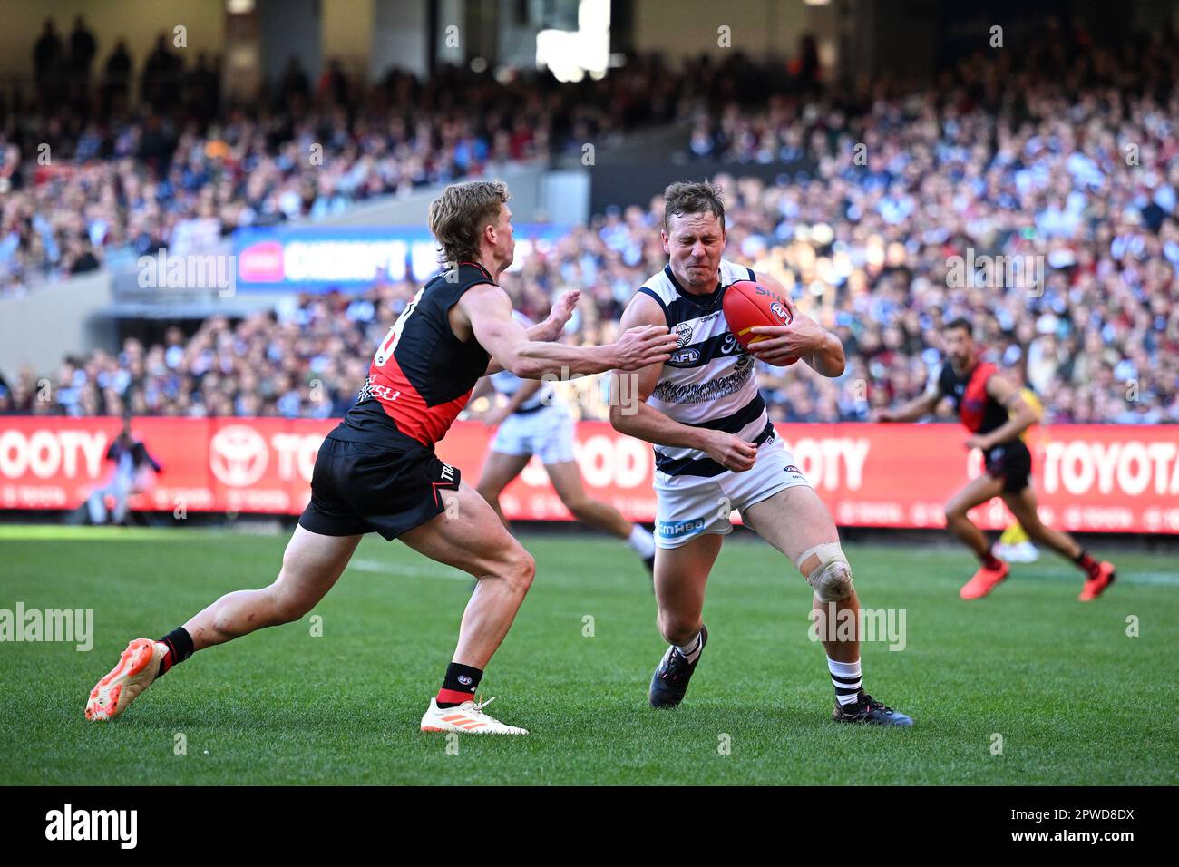 Mitch Duncan of Geelong (centre) in action during the AFL Round 7 match ...