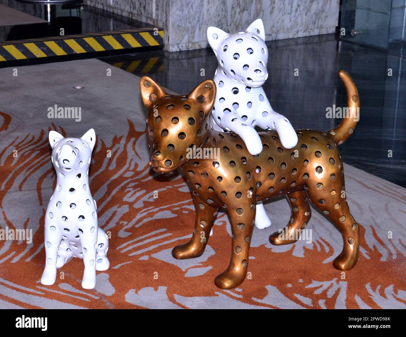 Small replicas of the large “I-Jud” or “Dots Dog” , an iconic sculpture ...