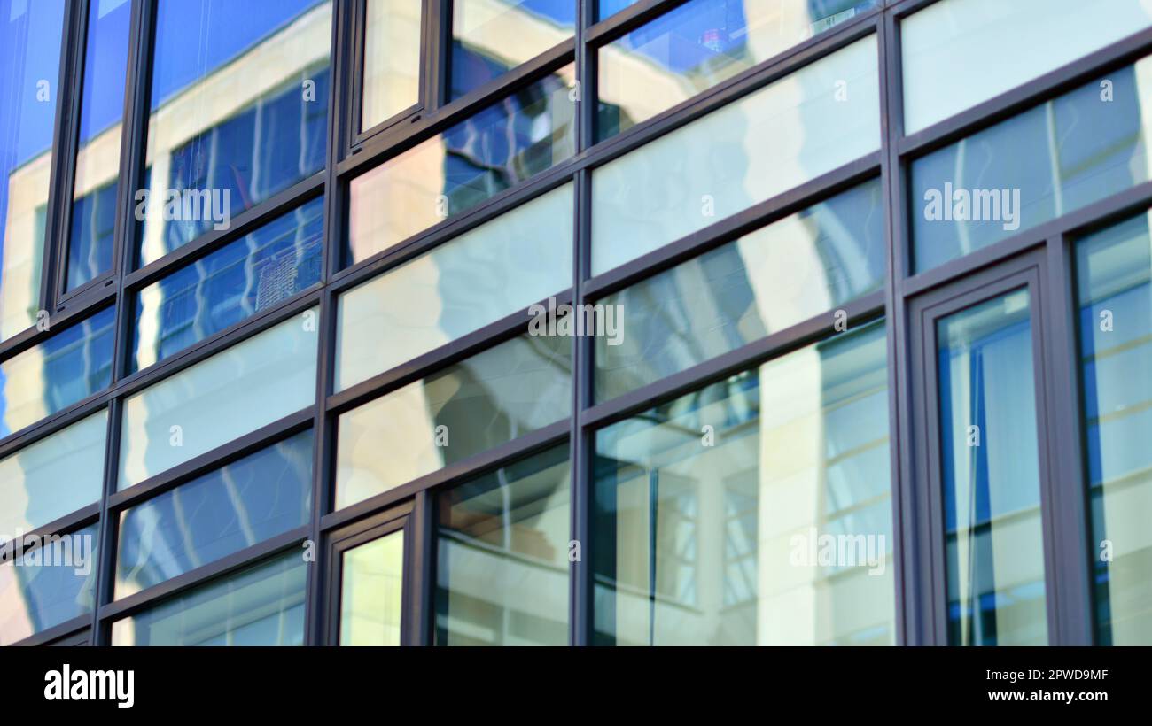Abstract fragment of contemporary architecture, walls made of glass and ...
