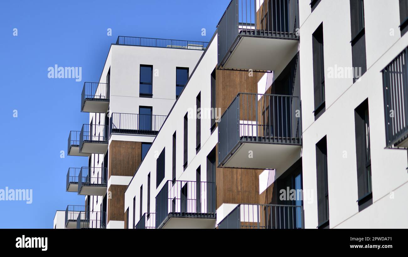 Modern apartment buildings on a sunny day with a blue sky. Facade of a ...