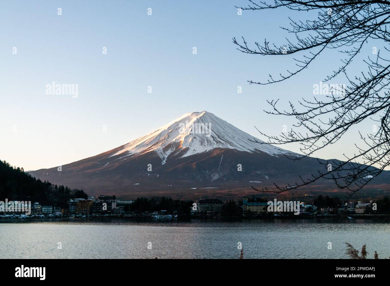 Mount Fuji on a bright winter morning, as seen from across lake ...