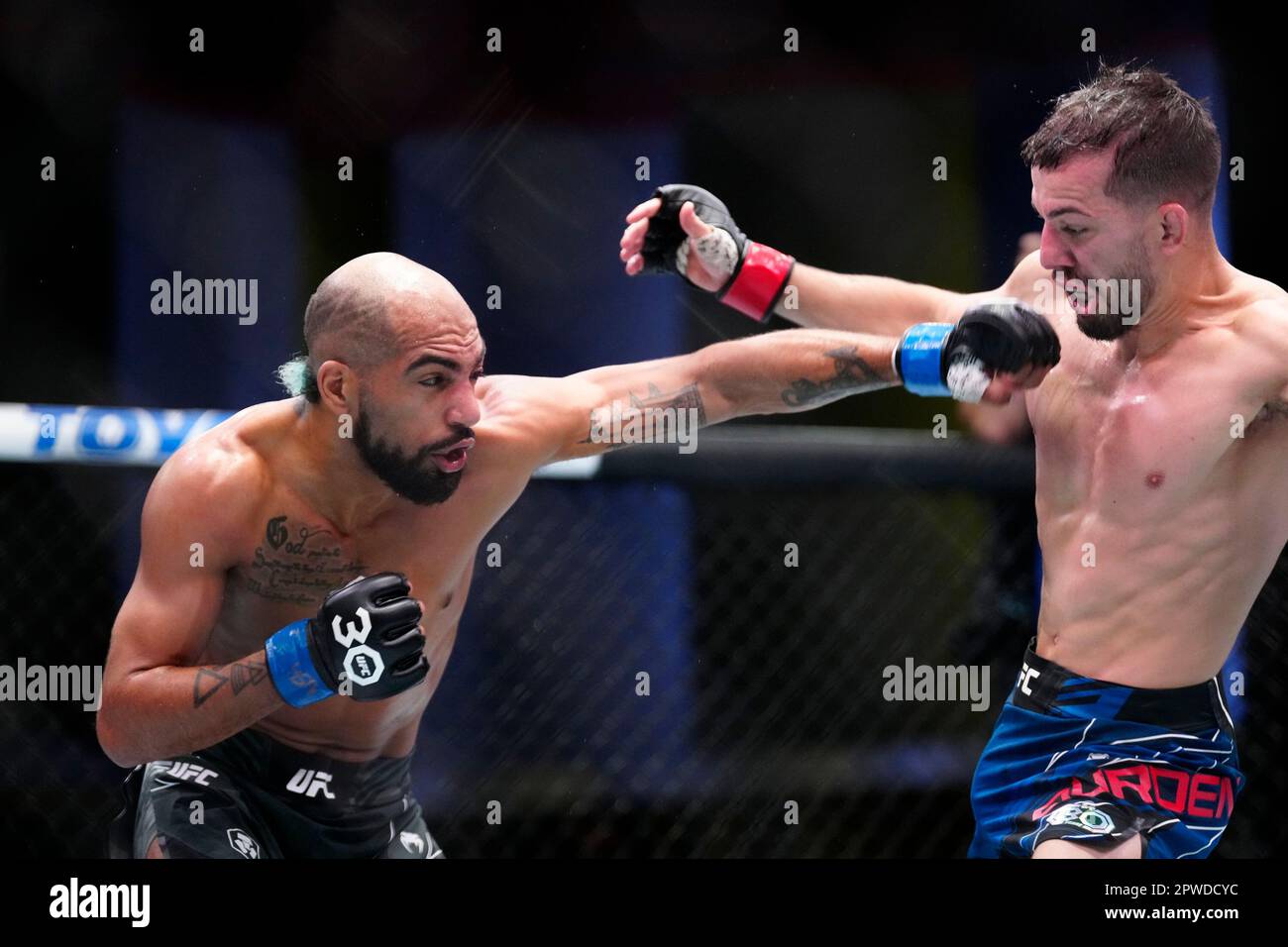 LAS VEGAS, NV - April 29: (L-R) Charles Johnson punches Cody Durden ...