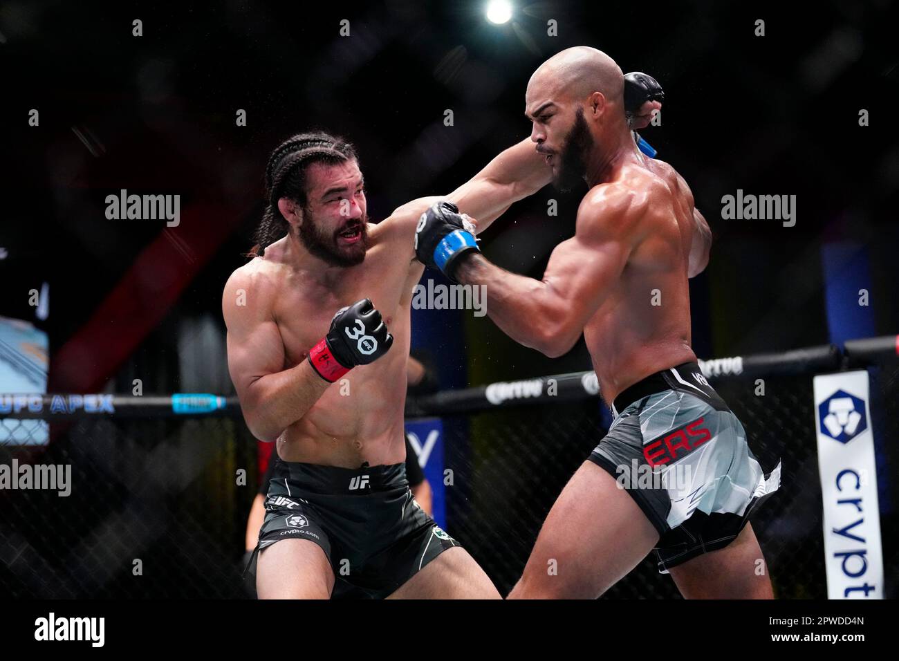 LAS VEGAS, NV - April 29: (R-L) Josh Quinlan punches Trey Waters fight ...