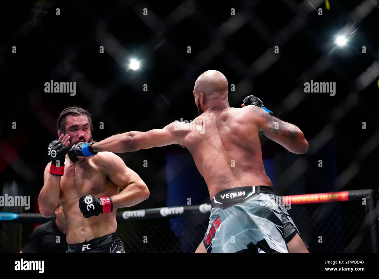 LAS VEGAS, NV - April 29: (R-L) Trey Waters punches Josh Quinlan fight ...