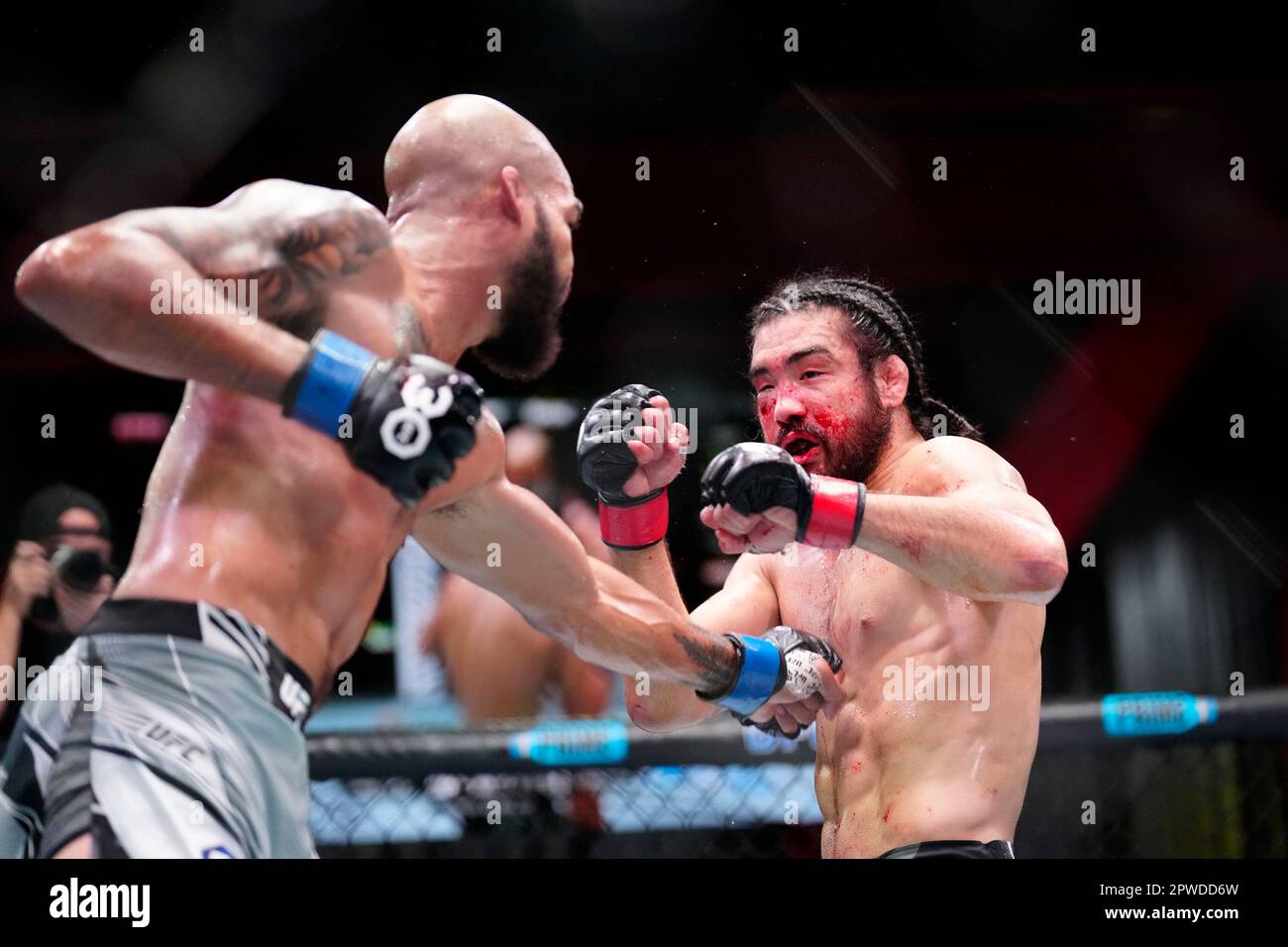 LAS VEGAS, NV - April 29: (L-R) Trey Waters punches Josh Quinlan fight ...