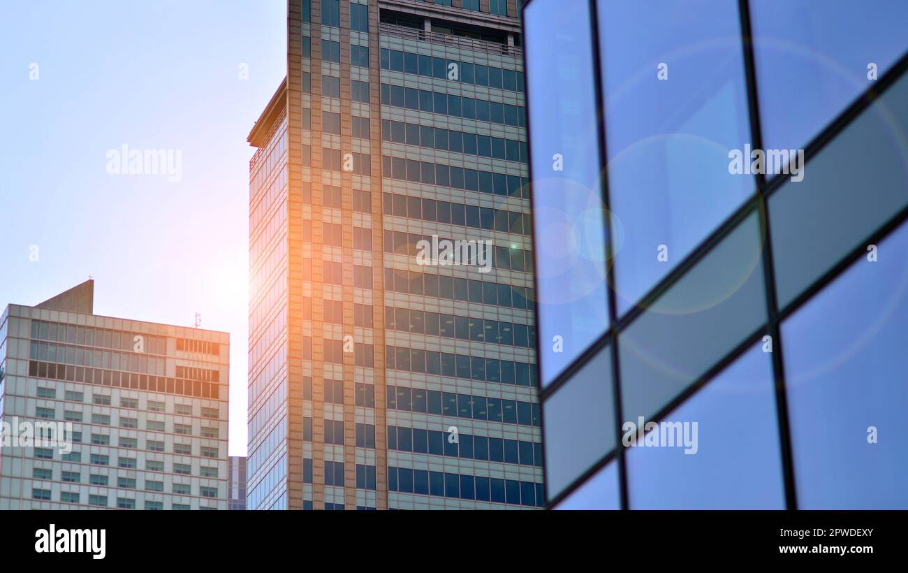 Windows of a modern glass building. Looking up at the commercial ...