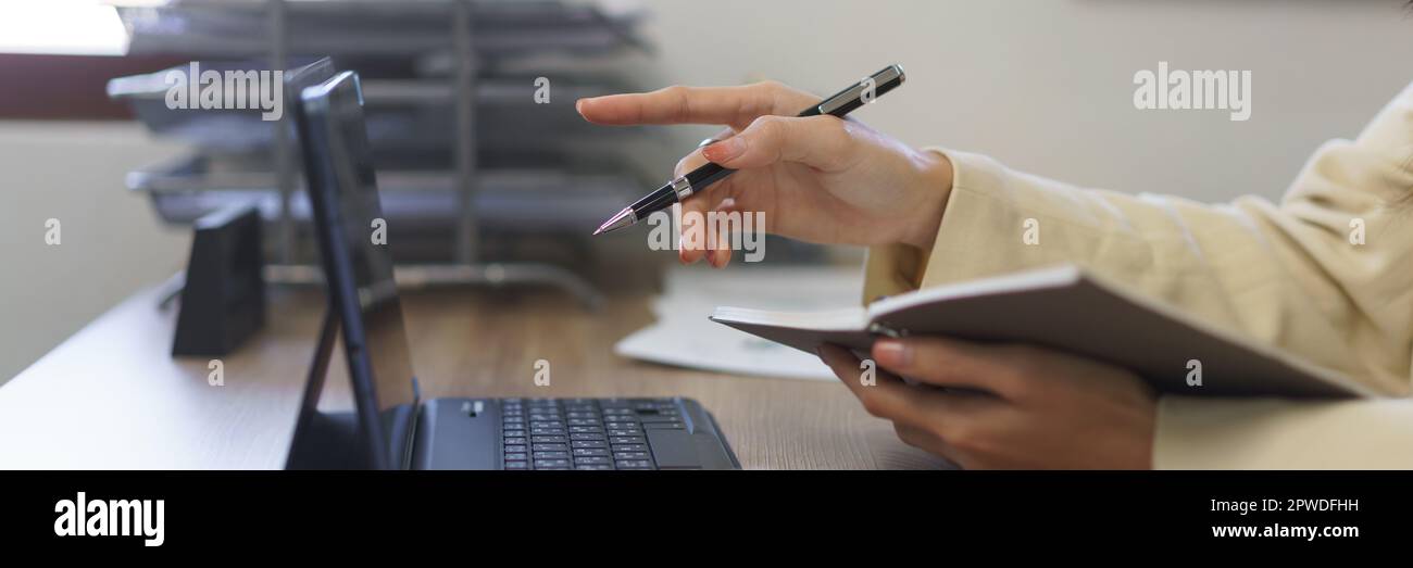 Secretary concept, Female secretary pointing business data on tablet ...