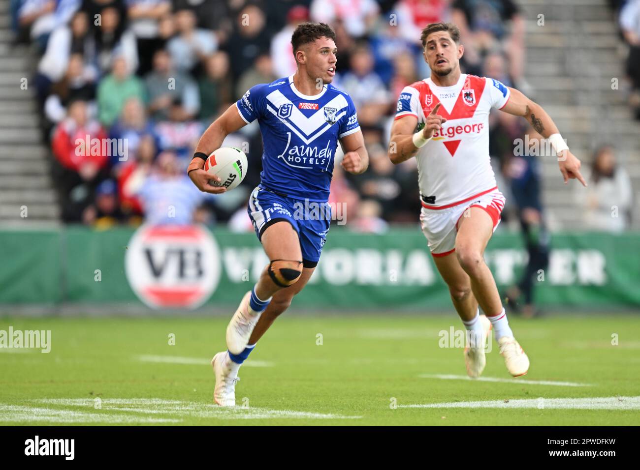 Jake Averillo of the Bulldogs breaks away to run in and score a try ...