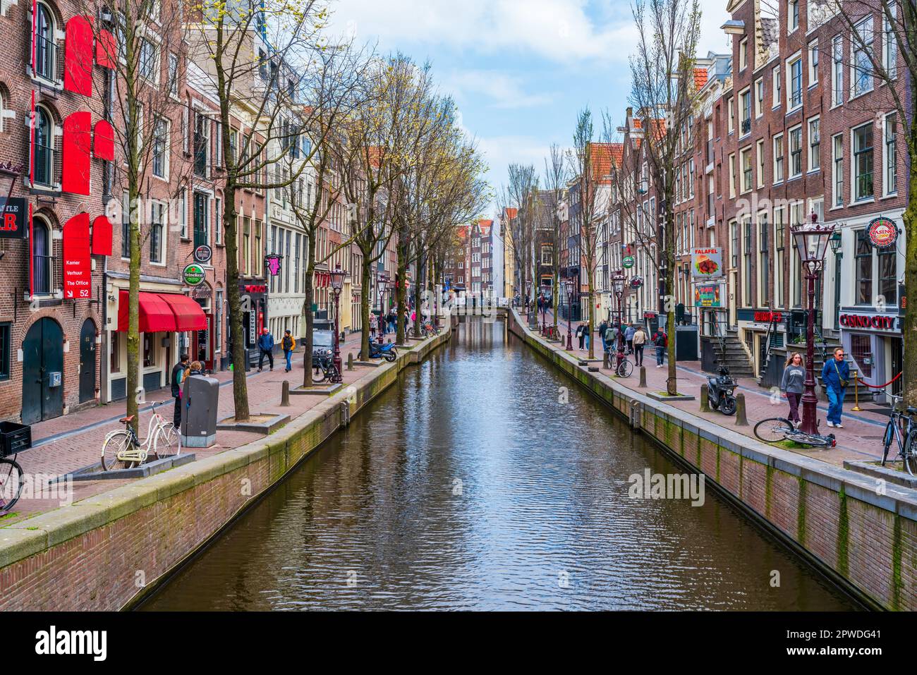 AMSTERDAM, HOLLAND - APRIL 18, 2023: View of a canal in Amsterdam ...