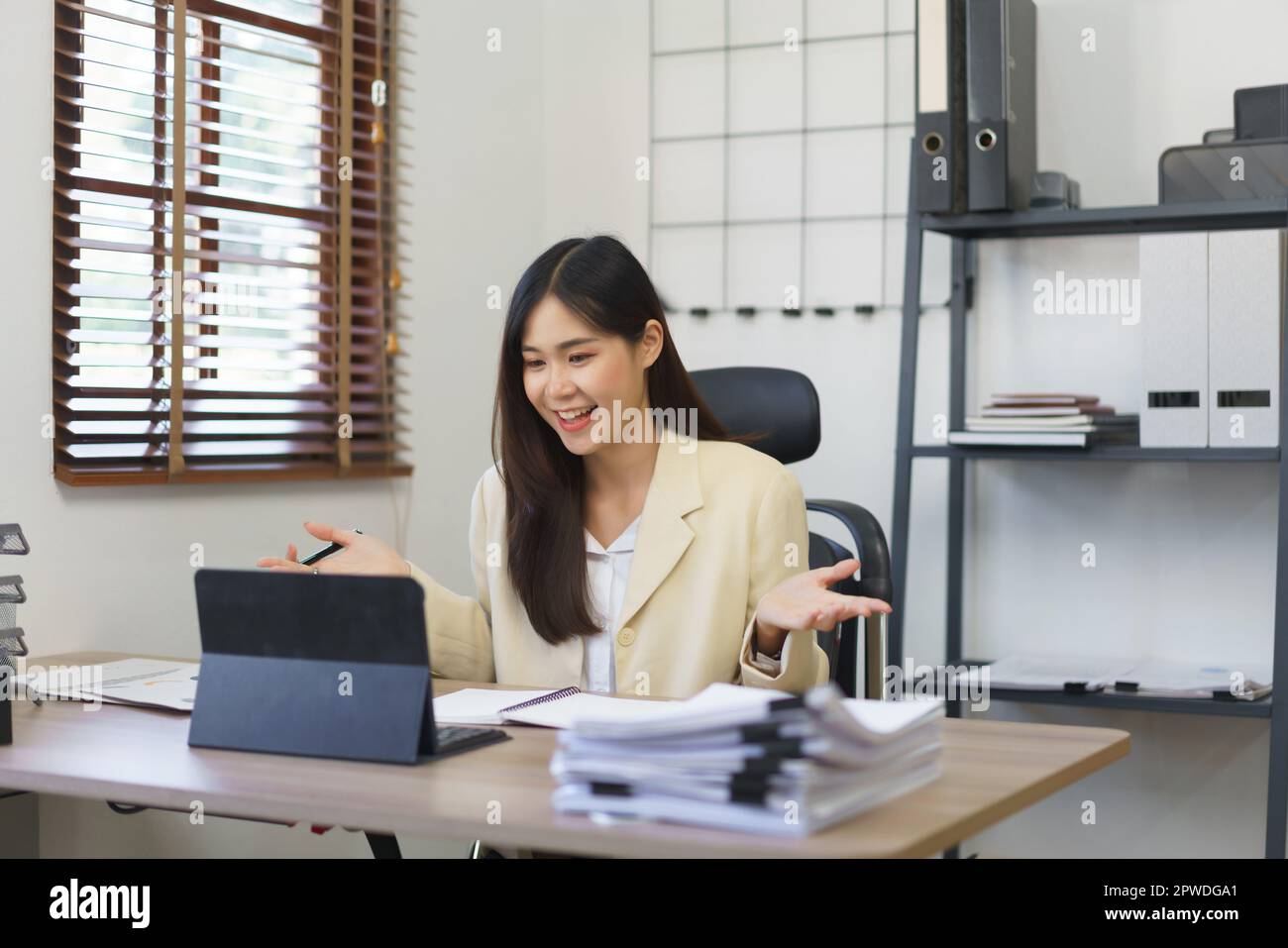 Secretary concept, Female secretary explains business data to executive ...