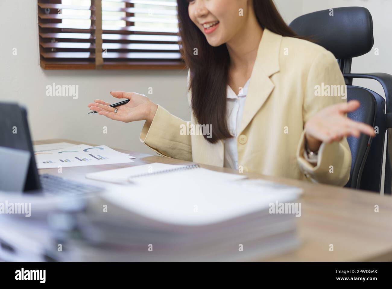 Secretary concept, Female secretary explains business data to executive ...