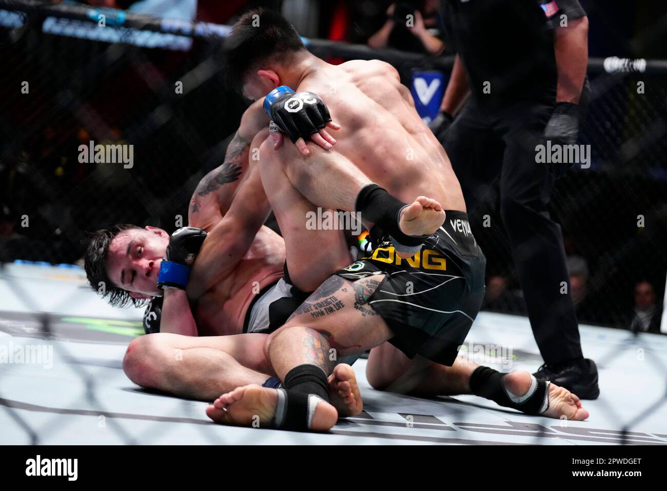 LAS VEGAS, NV - April 29: Song Yadong and Ricky Simon fight in a ...