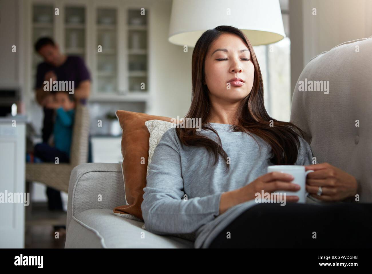 Moms need a timeout too. a young woman having a coffee break on the ...