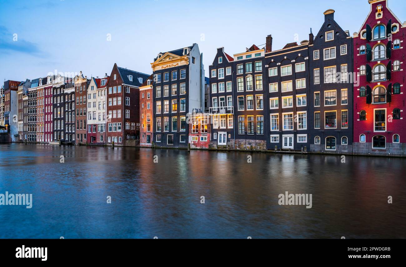 Typical Dutch houses in Amsterdam by the canal. Holland Stock Photo - Alamy