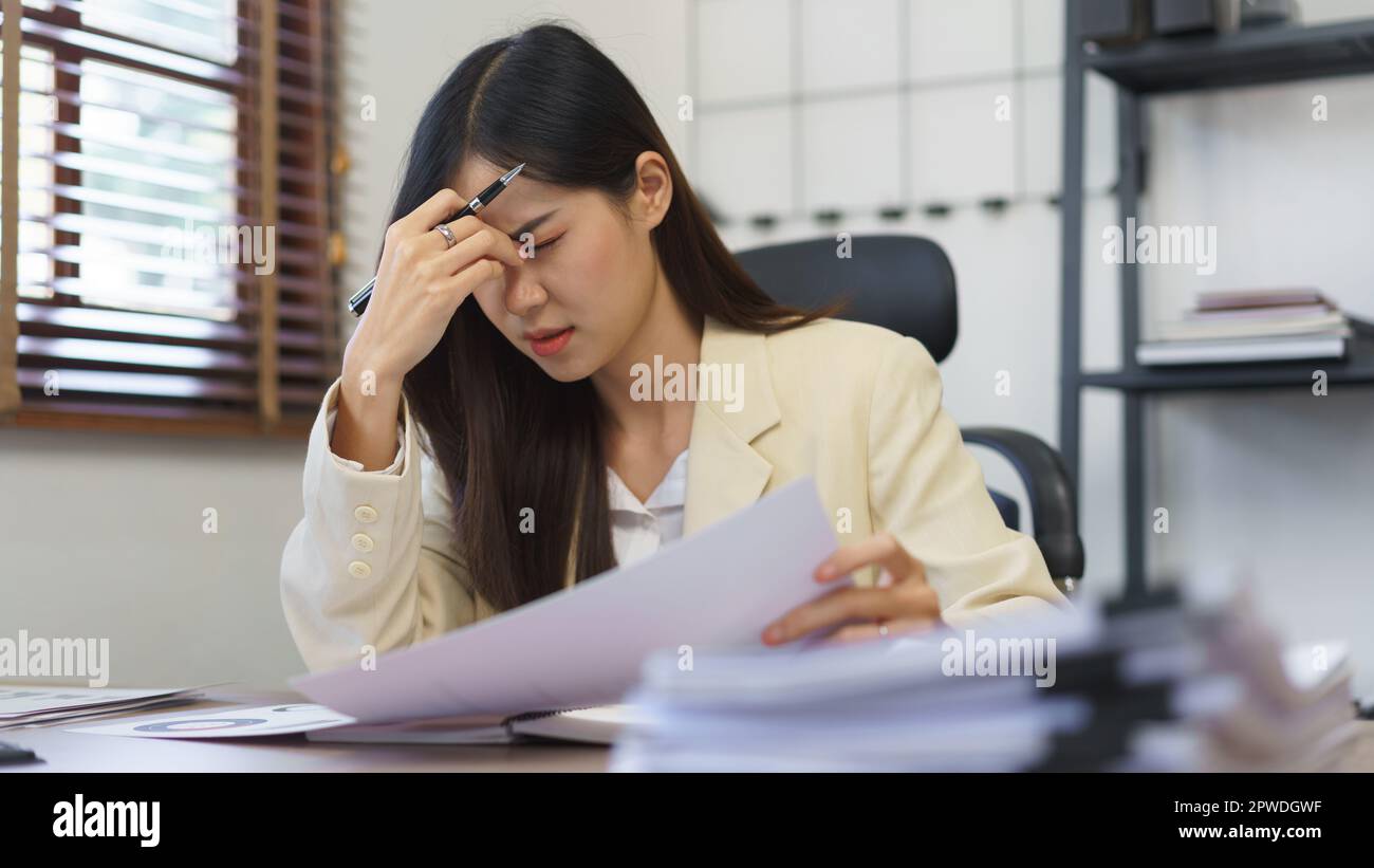 Work of secretary concept, Female secretary reading data on business ...