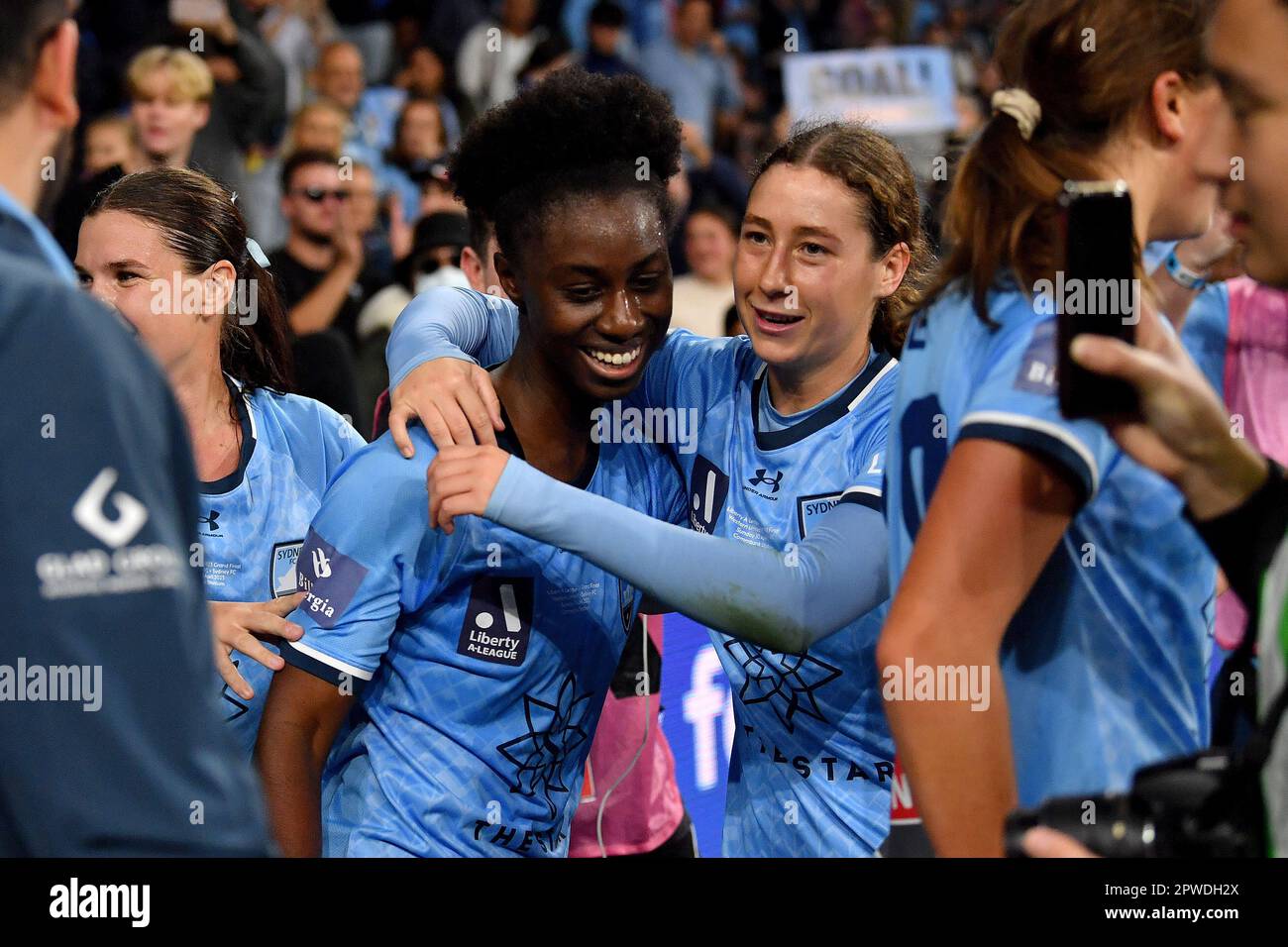 Princess Ibini-Isei of Sydney (centre) celebrates after scoring a goal ...