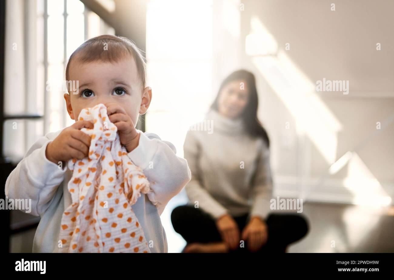 The world is a wondrous place for the young. an adorable baby girl ...