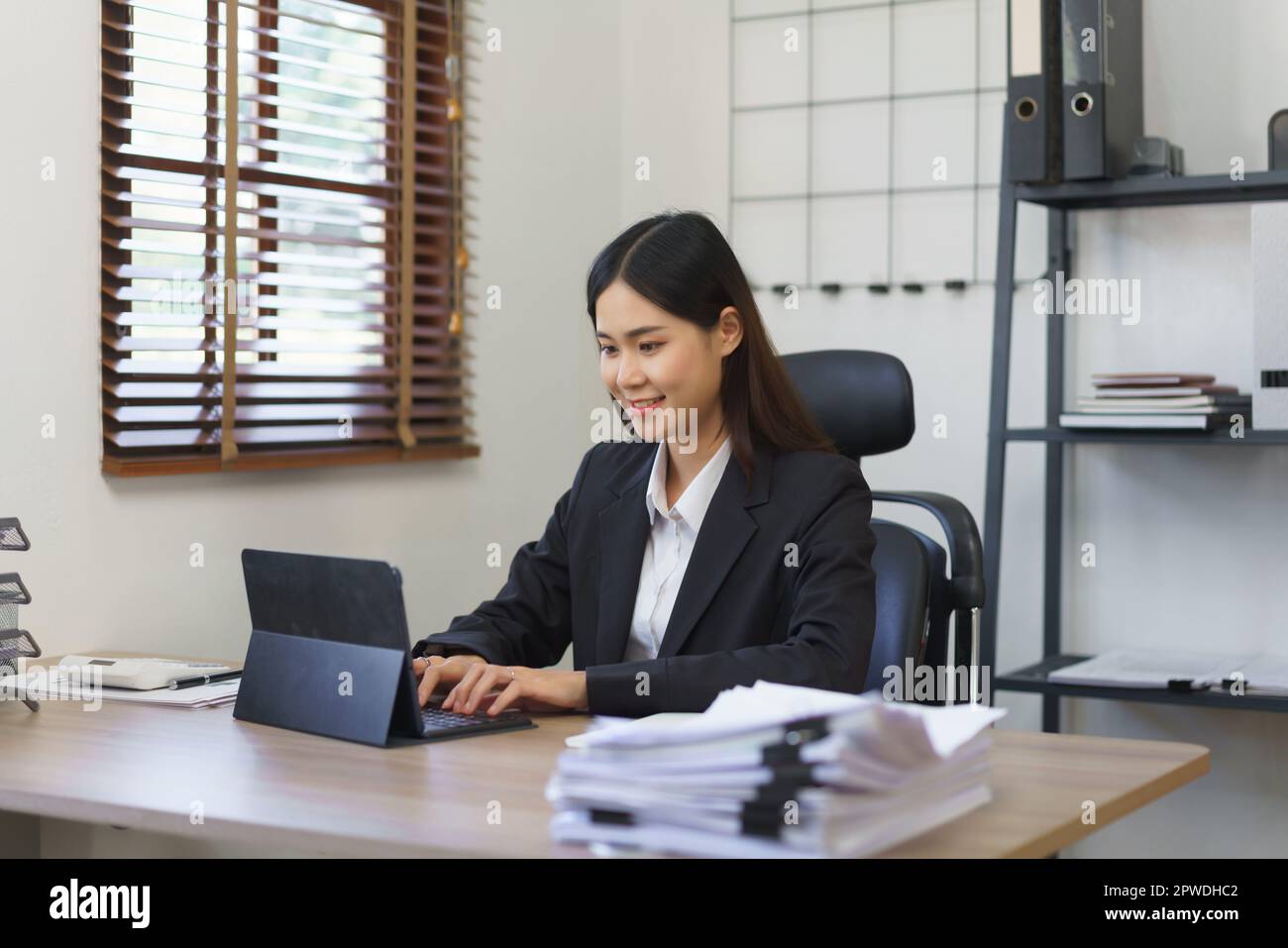 Work of secretary concept, Female secretary is working and typing ...