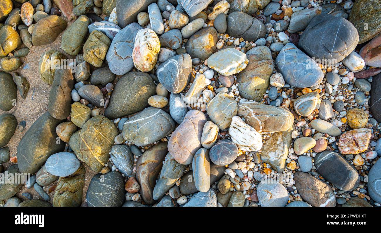 amazing to see on the beach is full of round rocks instead of sand ...