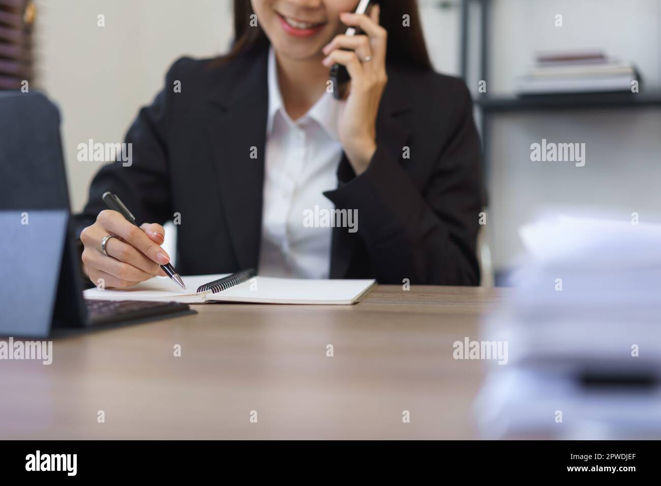 Work of secretary concept, Female secretary talks on phone with boss ...