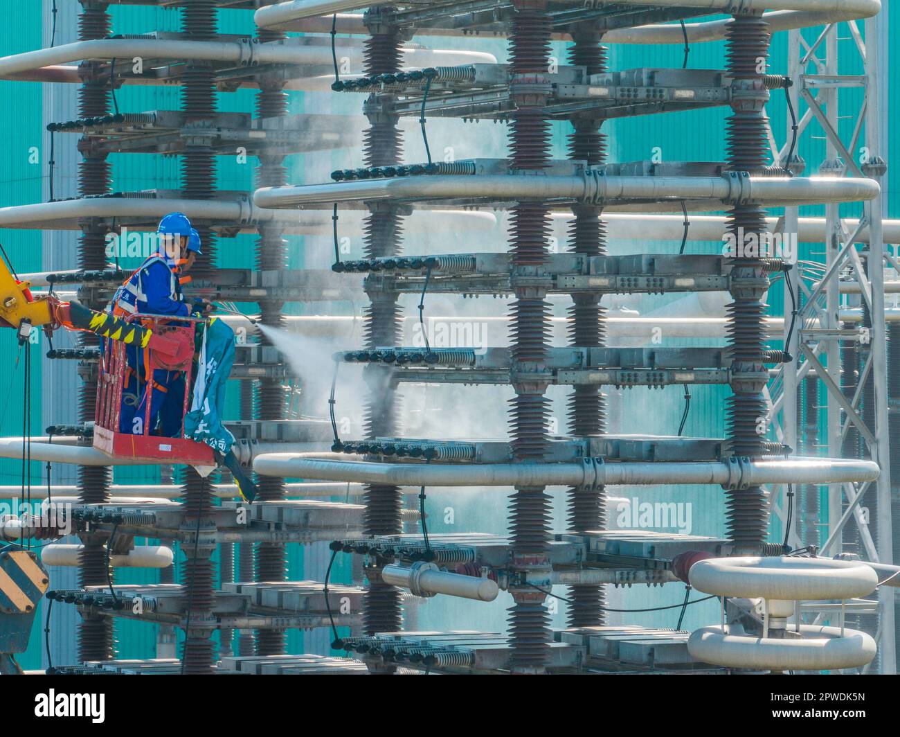 SUZHOU, CHINA - APRIL 30, 2023 - Power maintenance personnel repair ...