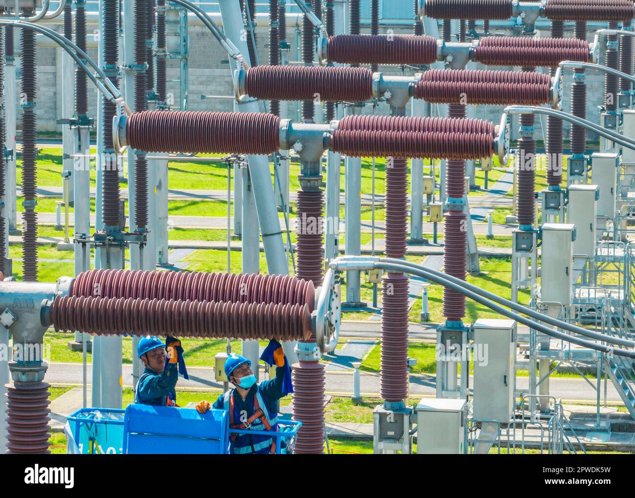 SUZHOU, CHINA - APRIL 30, 2023 - Power maintenance personnel repair ...