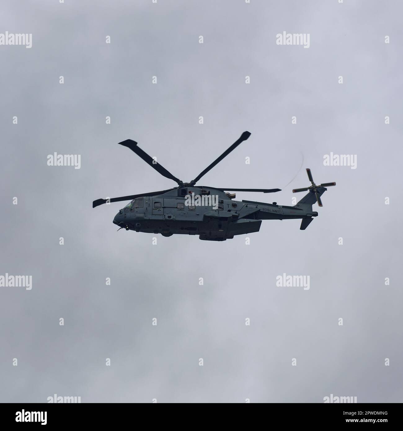 A Merlin Mk 4 Helicopter approaching HMS Condor flying low heading into ...