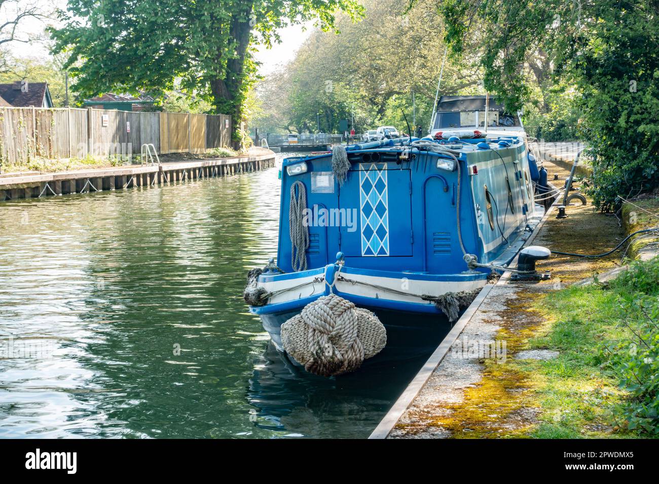 A narrowboat moored on the side of The River Thames at Reading in ...