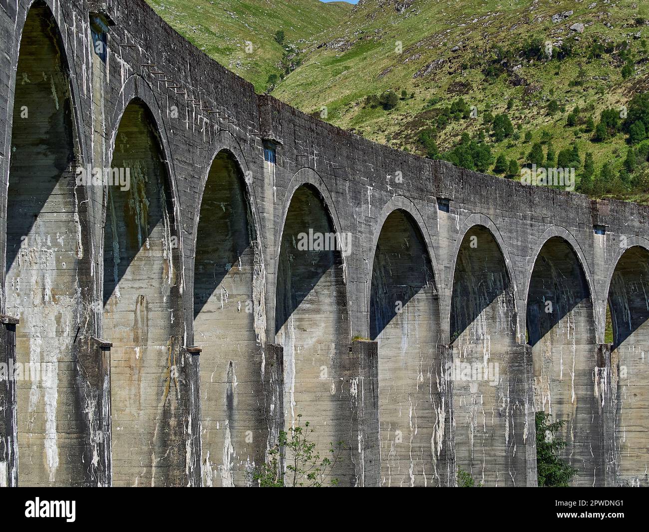 iconic Glenfinnan viaduct of the jacobite steam train in the scottish ...