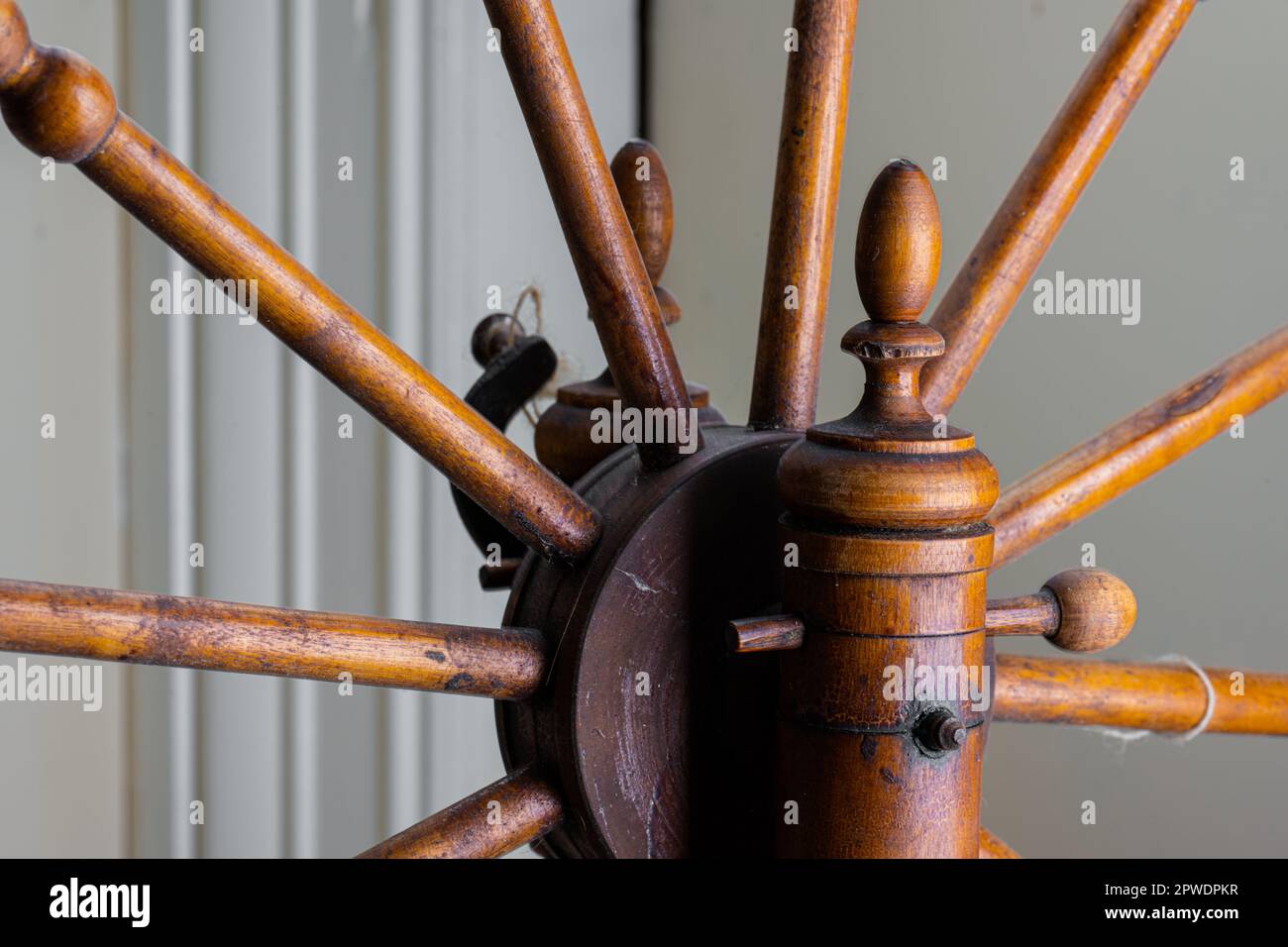 Details of an old wooden spinning rock Stock Photo - Alamy