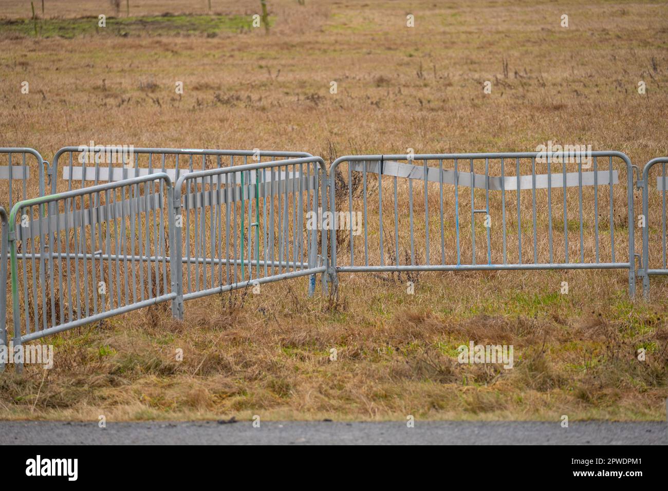 Temporary metal fence blocking off at a construction site Stock Photo ...