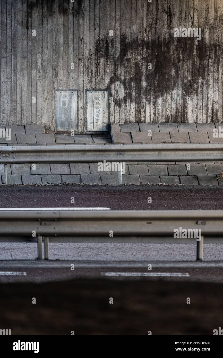 Small metal covers on the wall of a roadway underpass Stock Photo - Alamy
