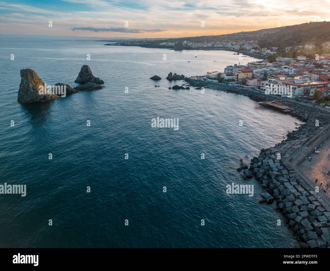 Stunning aerial view of the Acitrezza stacks on the Sicilian coast ...