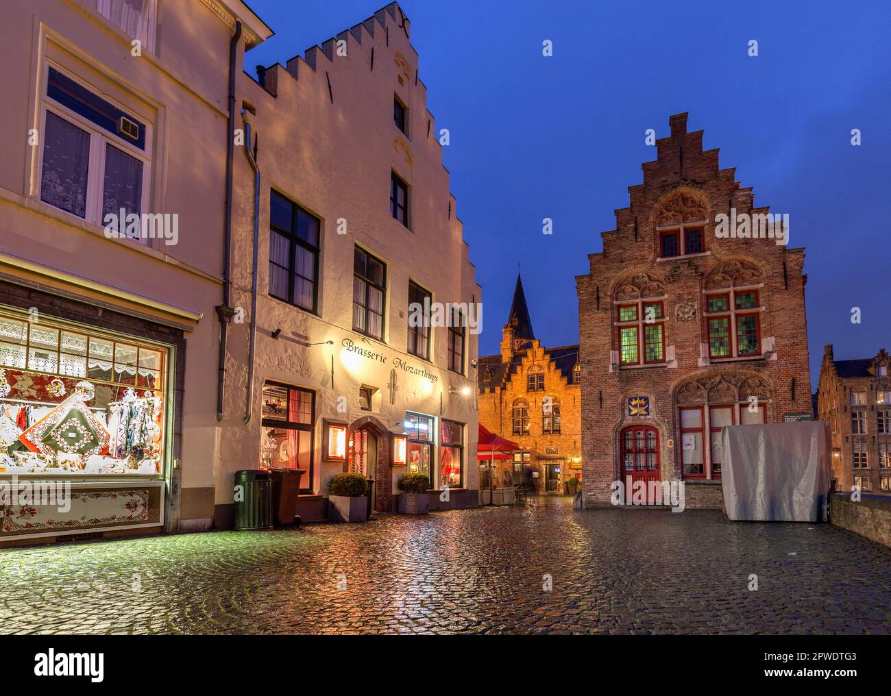Historic buildings including lace shop in Huidenvettersplein at ...