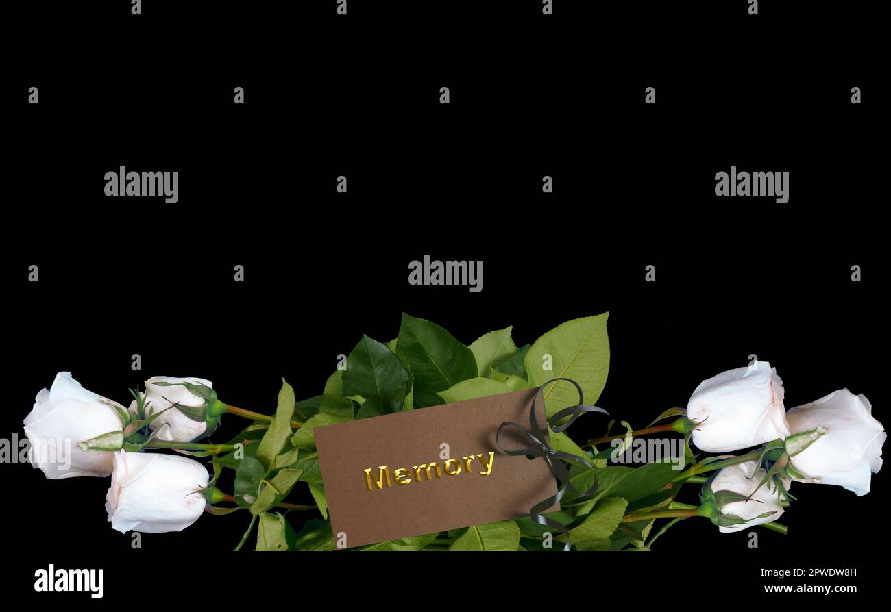 Death card, funeral, commemoration with white roses on a black ...