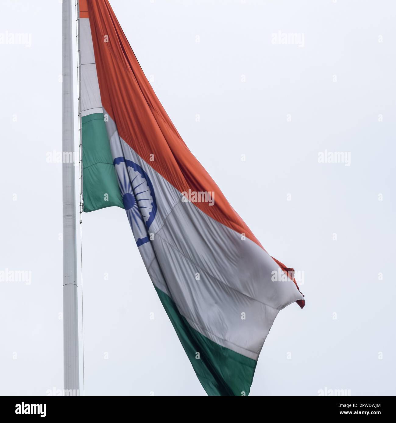India flag flying high at Connaught Place with pride in blue sky, India ...
