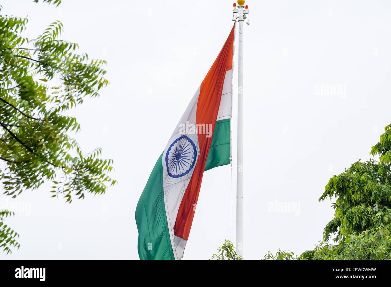 India flag flying high at Connaught Place with pride in blue sky, India ...