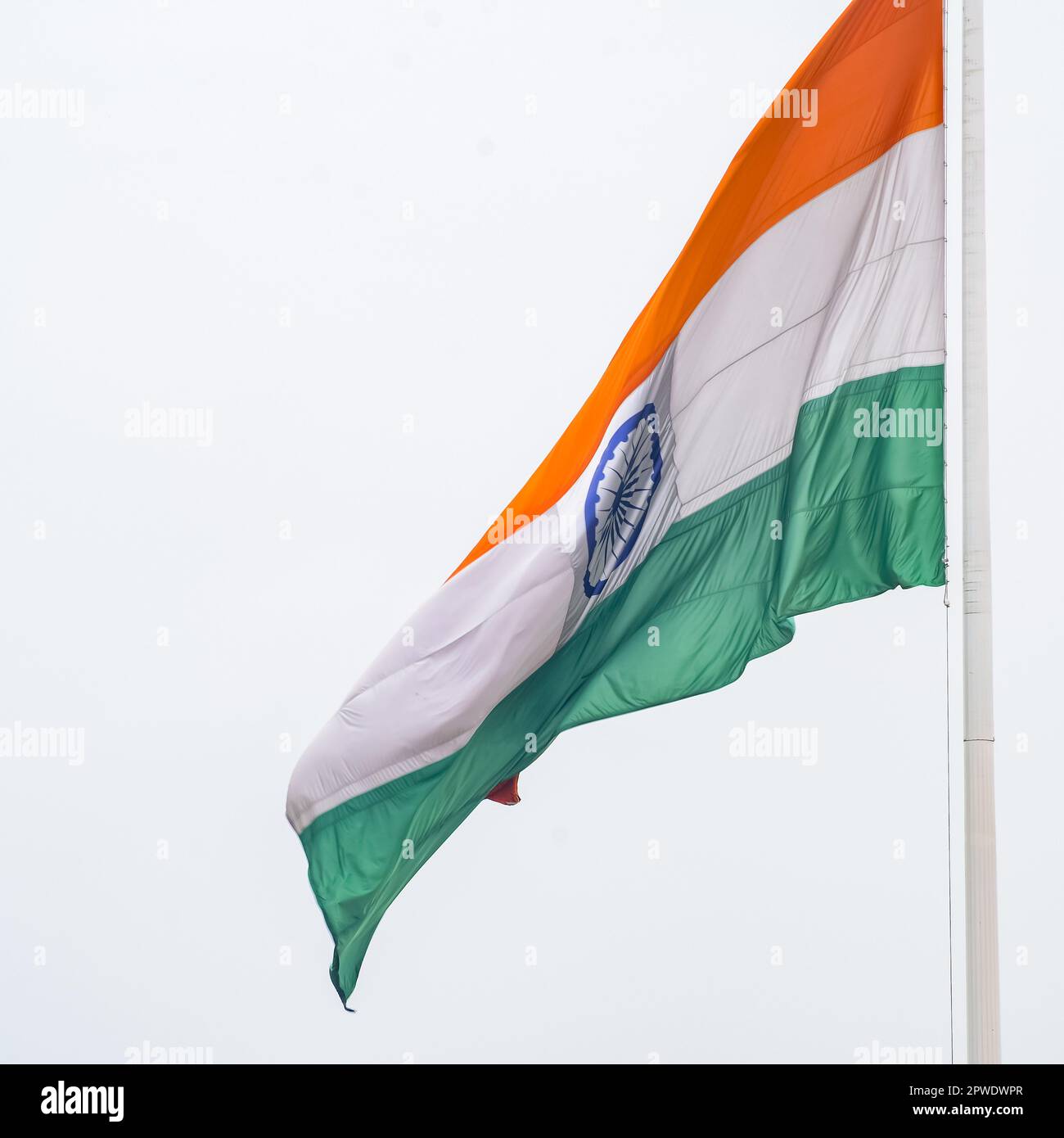 India flag flying high at Connaught Place with pride in blue sky, India ...