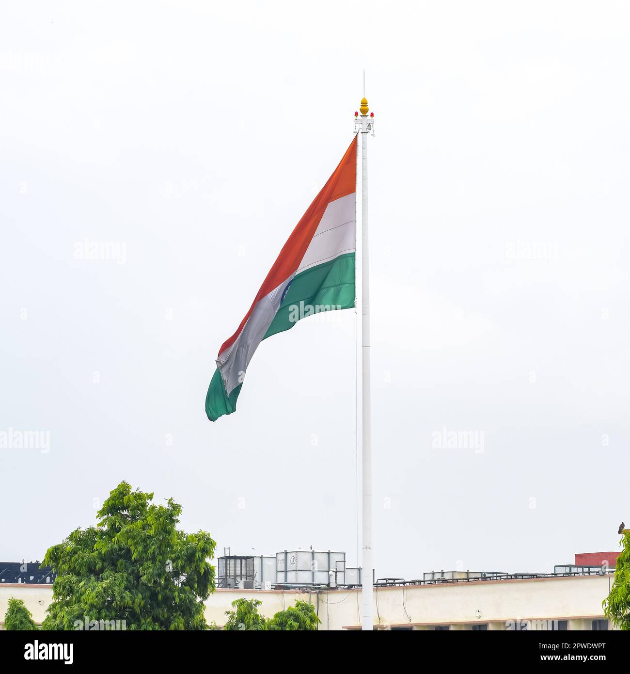 India flag flying high at Connaught Place with pride in blue sky, India ...