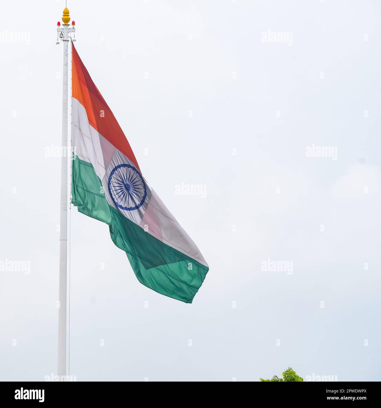 India flag flying high at Connaught Place with pride in blue sky, India ...