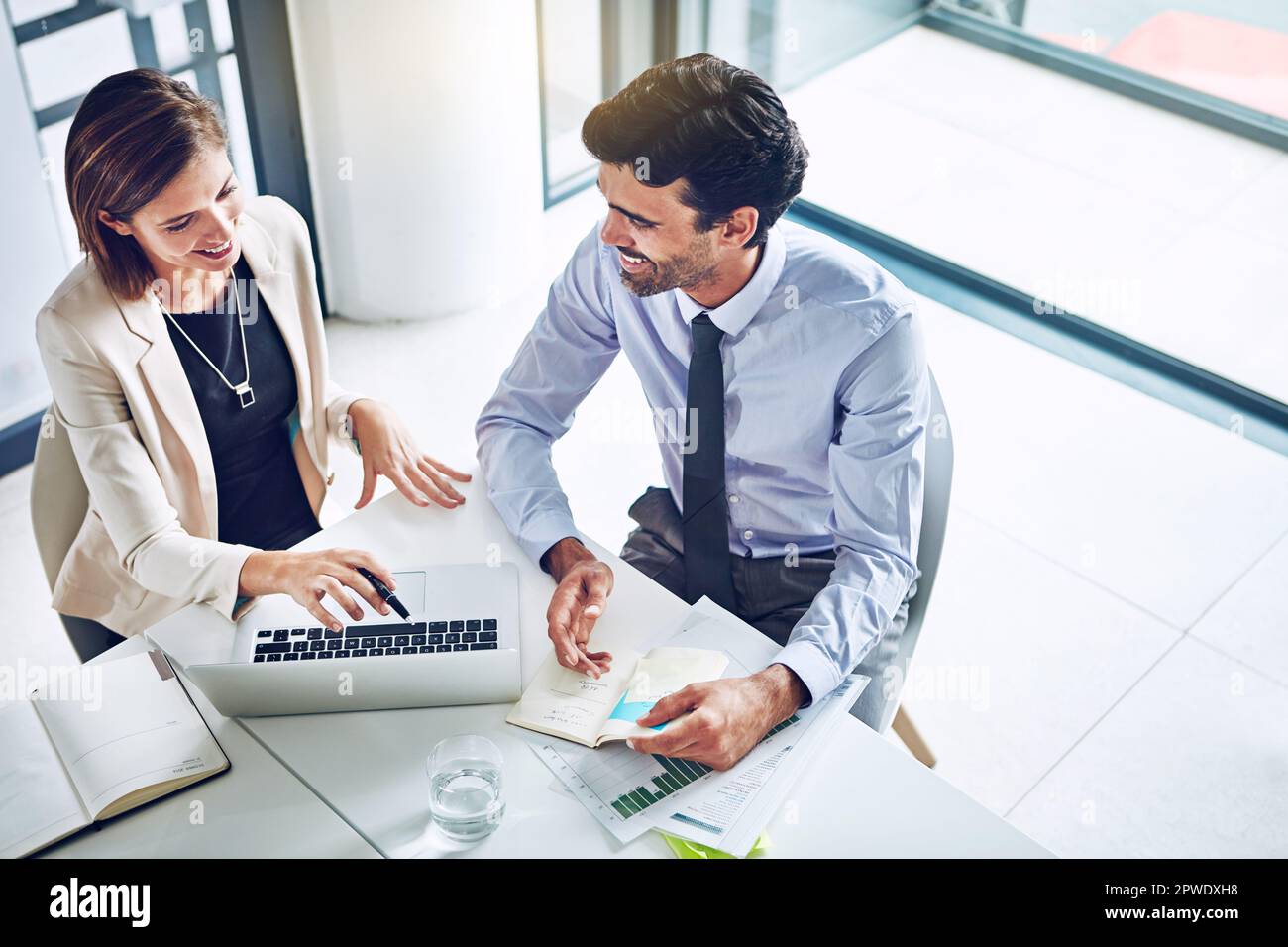 Meeting their objectives through teamwork and hard work. two corporate ...