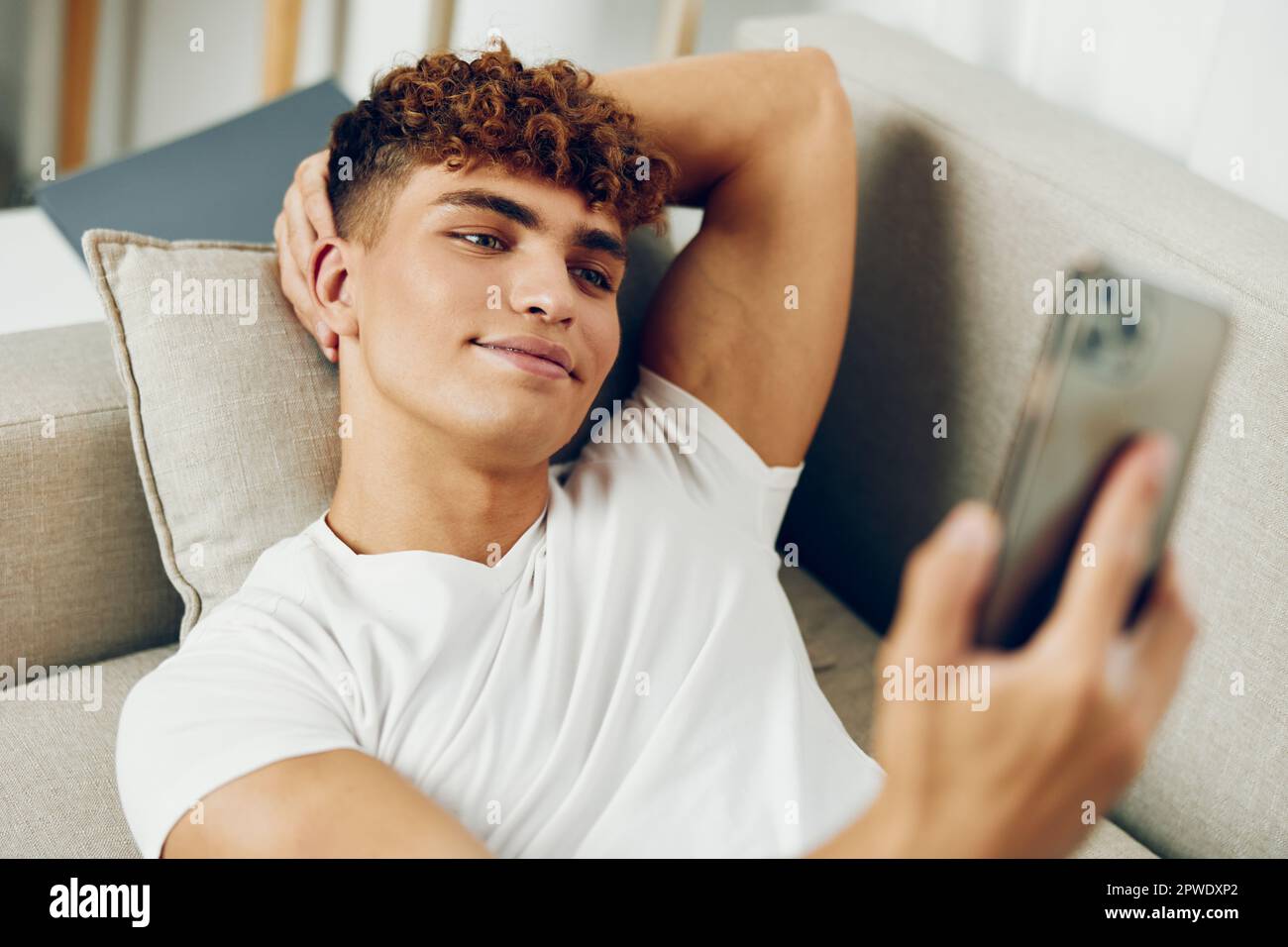 man interior couch curly text blogger sofa using text message talking ...