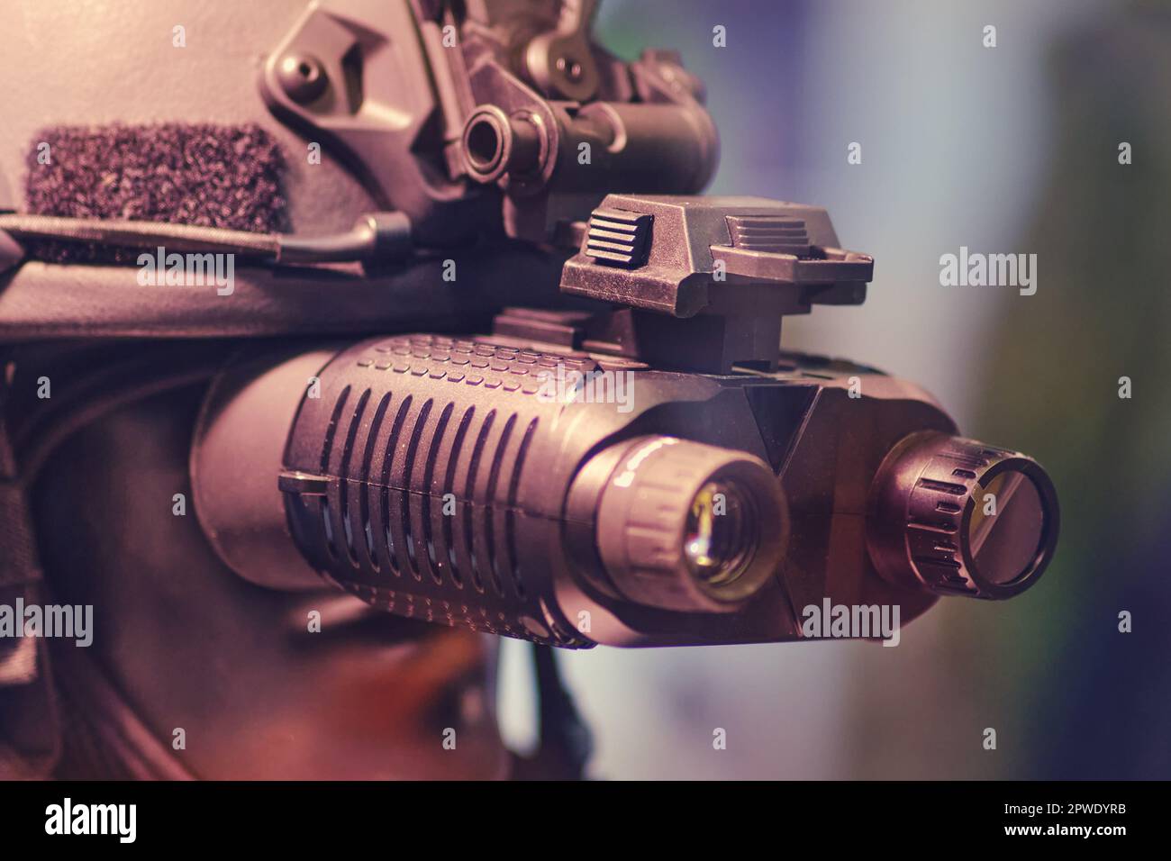 Army binoculars with night vision on a soldier's helmet. Optical device ...