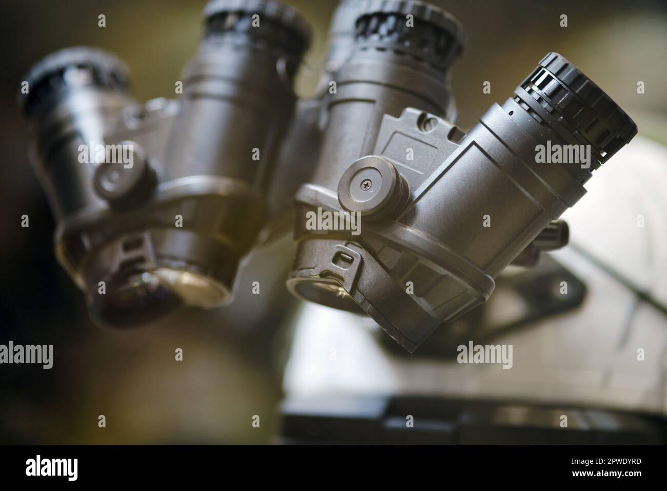 Army binoculars with night vision on a soldier's helmet. Optical device ...
