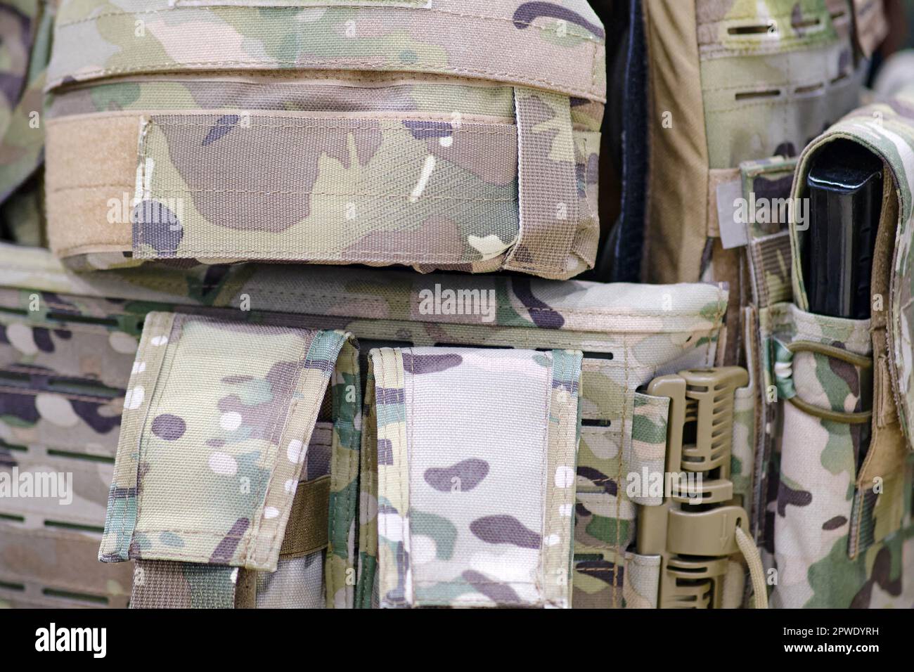 Army pouches and a holster with weapons for military uniforms. Bags for ...