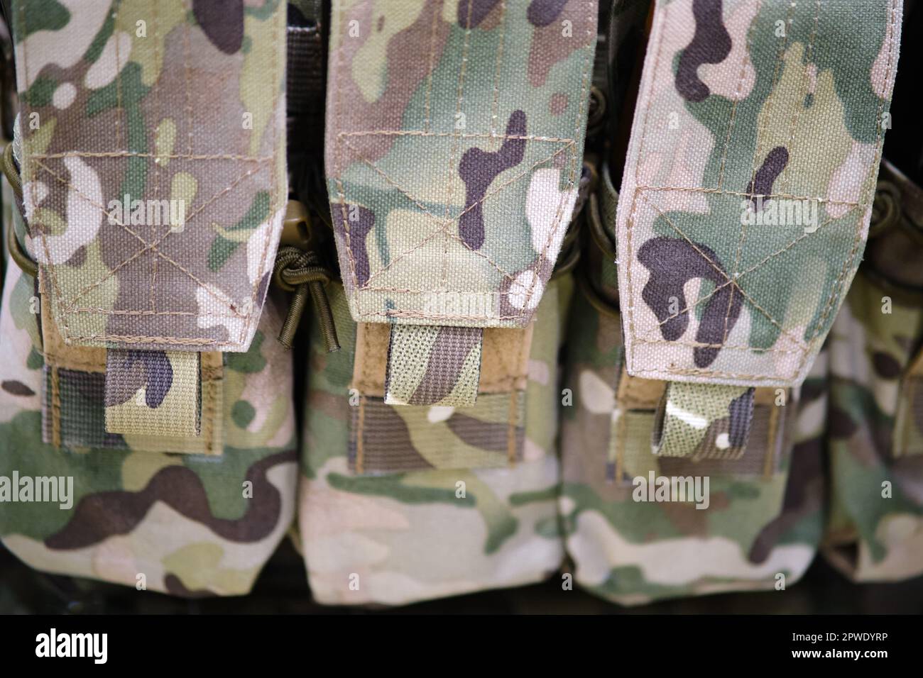 Army pouches and a holster with weapons for military uniforms. Bags for ...