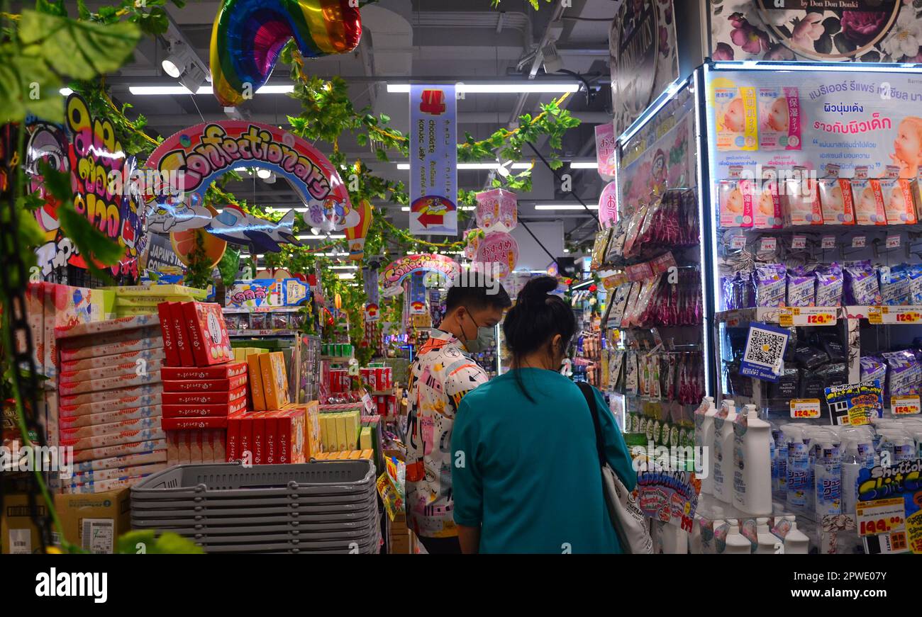 Shoppers look at products for sale in Don Don Donki, a Japanese ...