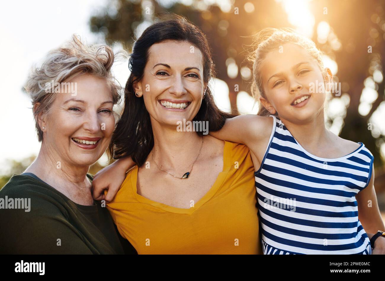 Three generations of beauty. Portrait of a cute little girl posing ...
