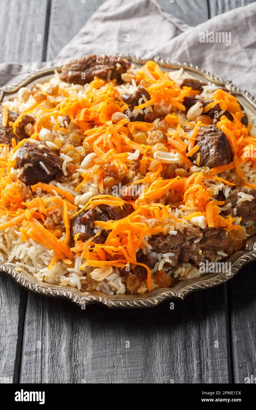 Delicious colorful Afghan rice pilaf Kabuli pulao with lamb and raisin ...